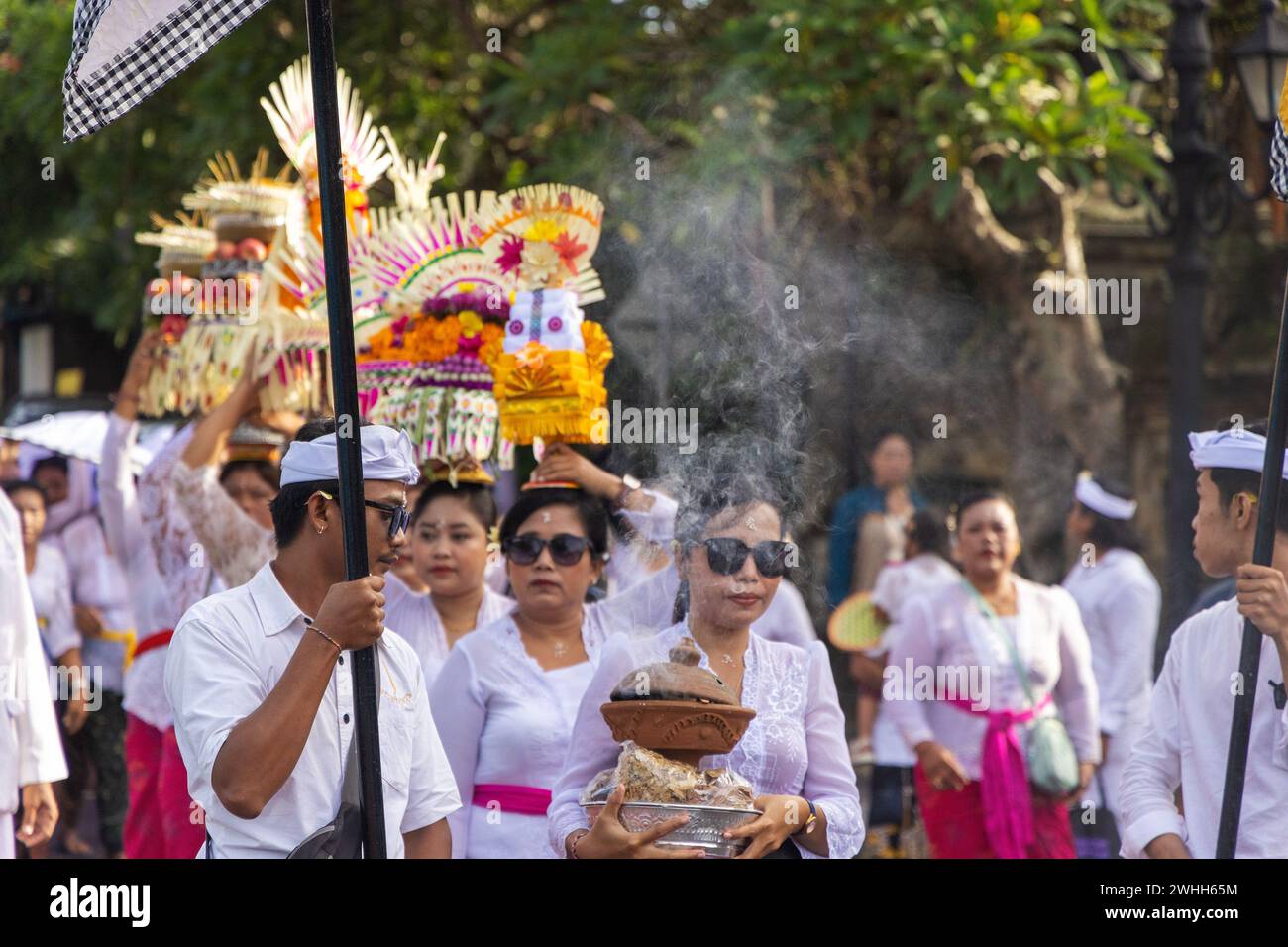 People in traditional clothes on the streets of Ubud, Bali Stock Photo ...