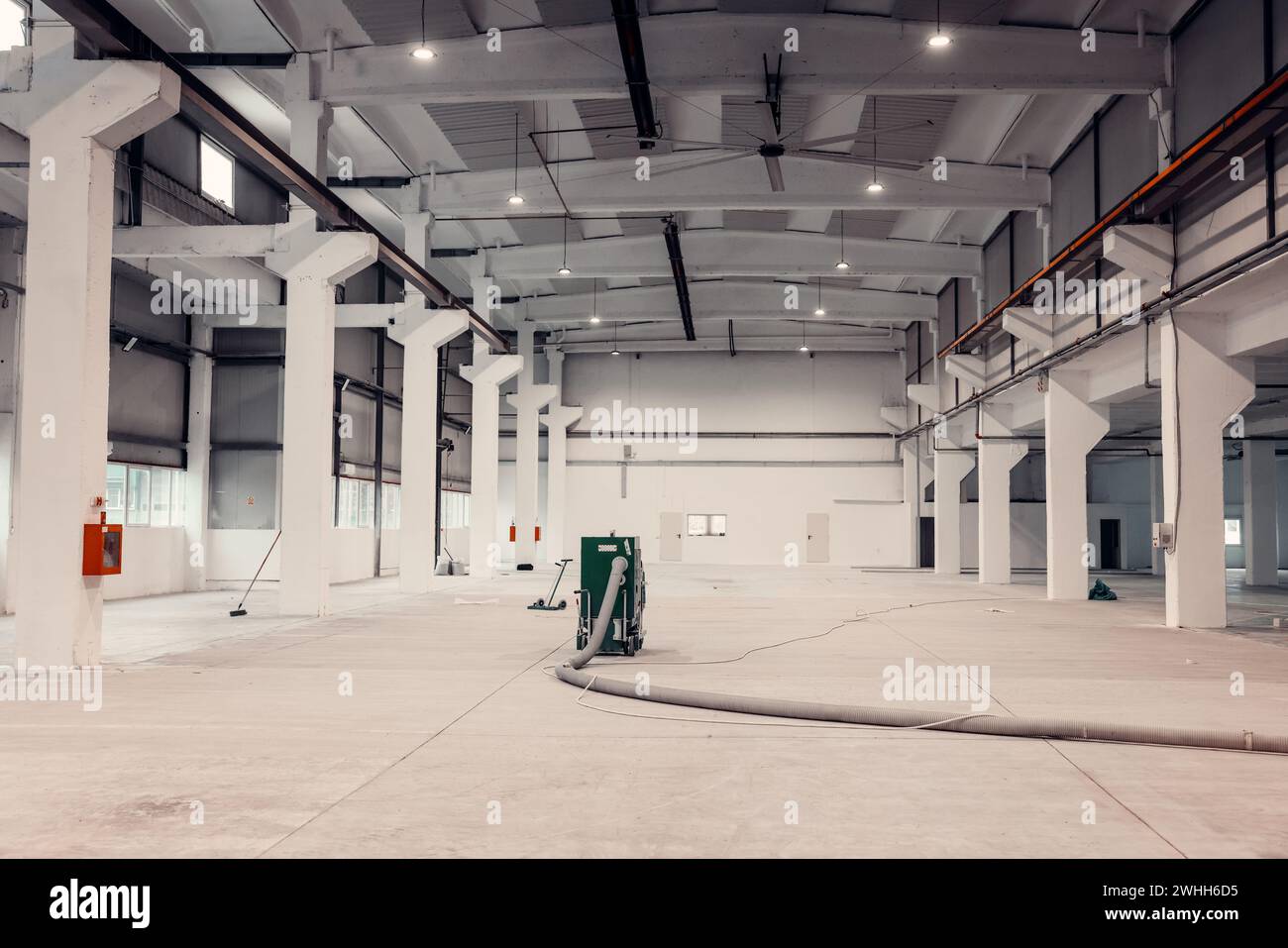 Maintenance for a modern industrial warehouse. Heat equipment in the ...