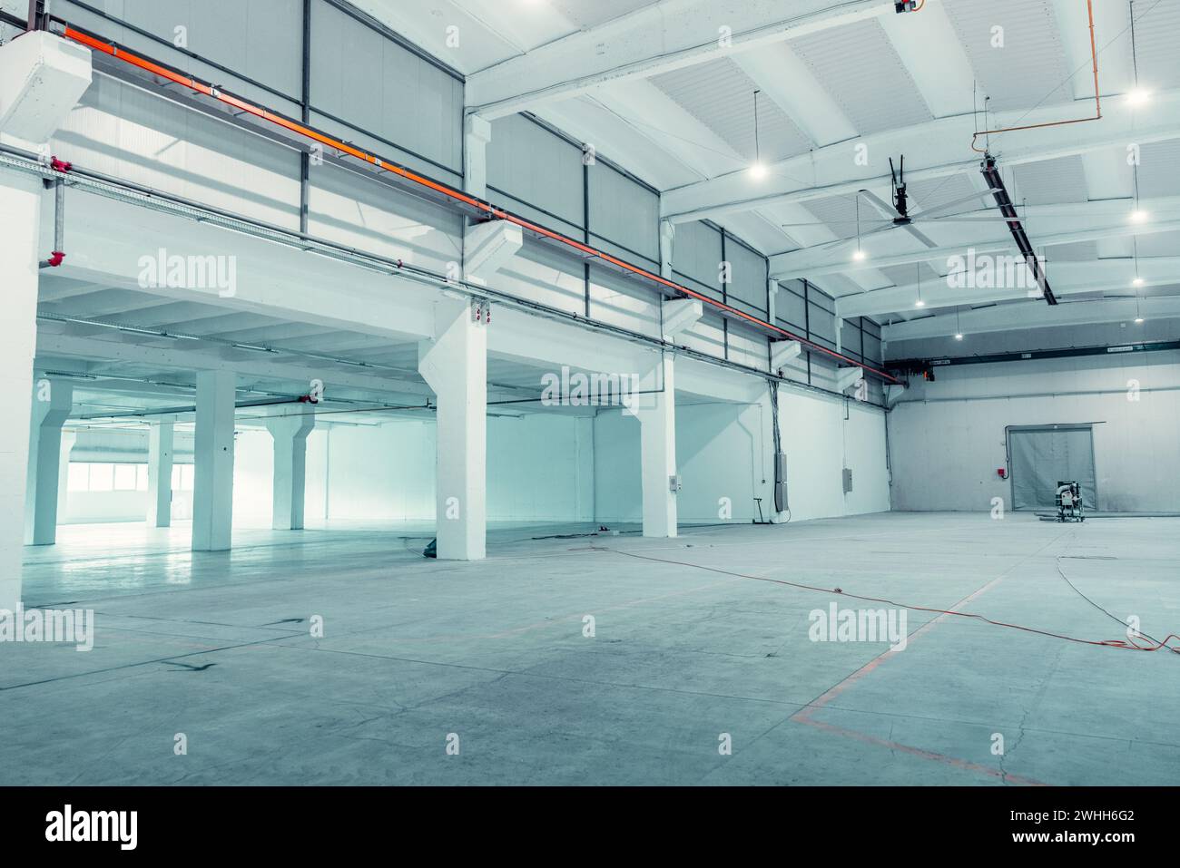 Empty moderna and spacious warehouse currently under work Stock Photo ...