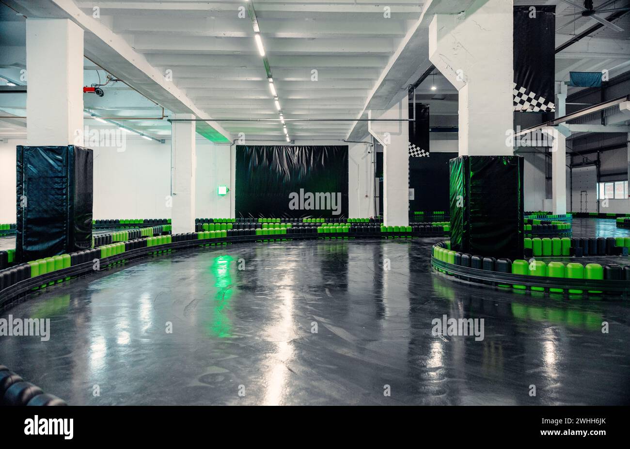 Inside of a Karting place empty, only with bumpers Stock Photo - Alamy