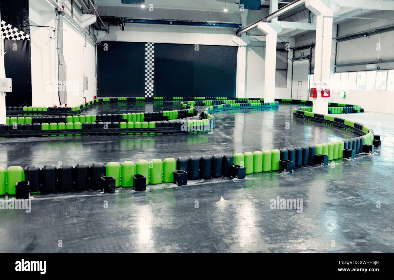 Inside of a Karting place empty, only with bumpers Stock Photo - Alamy
