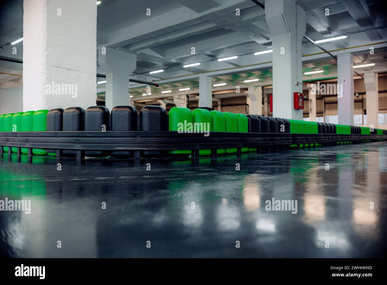 Empty Indoor Go Kart Racing playground epoxy floor Stock Photo - Alamy
