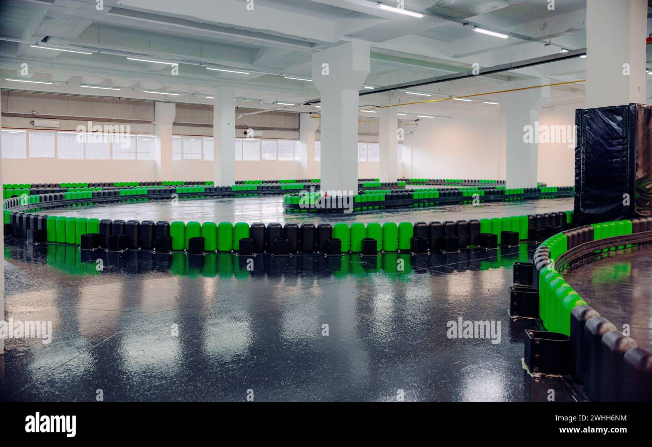 Empty Indoor Go Kart Racing playground Stock Photo - Alamy