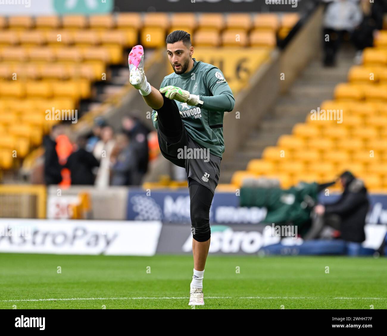 Thomas Strakosha of Brentford warms up ahead of the match, during the ...