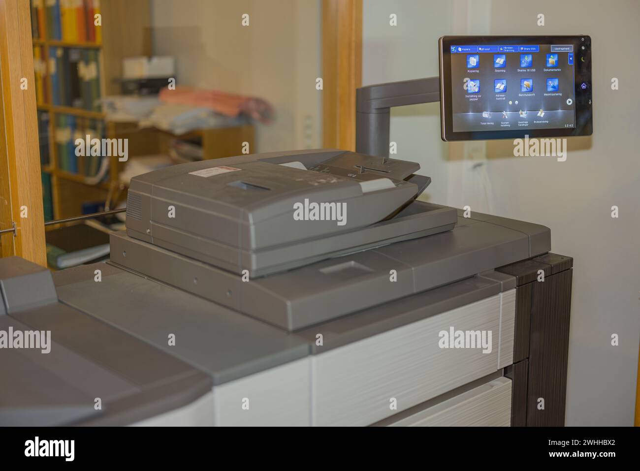 Interior of office building featuring SHARP color laser multifunction ...