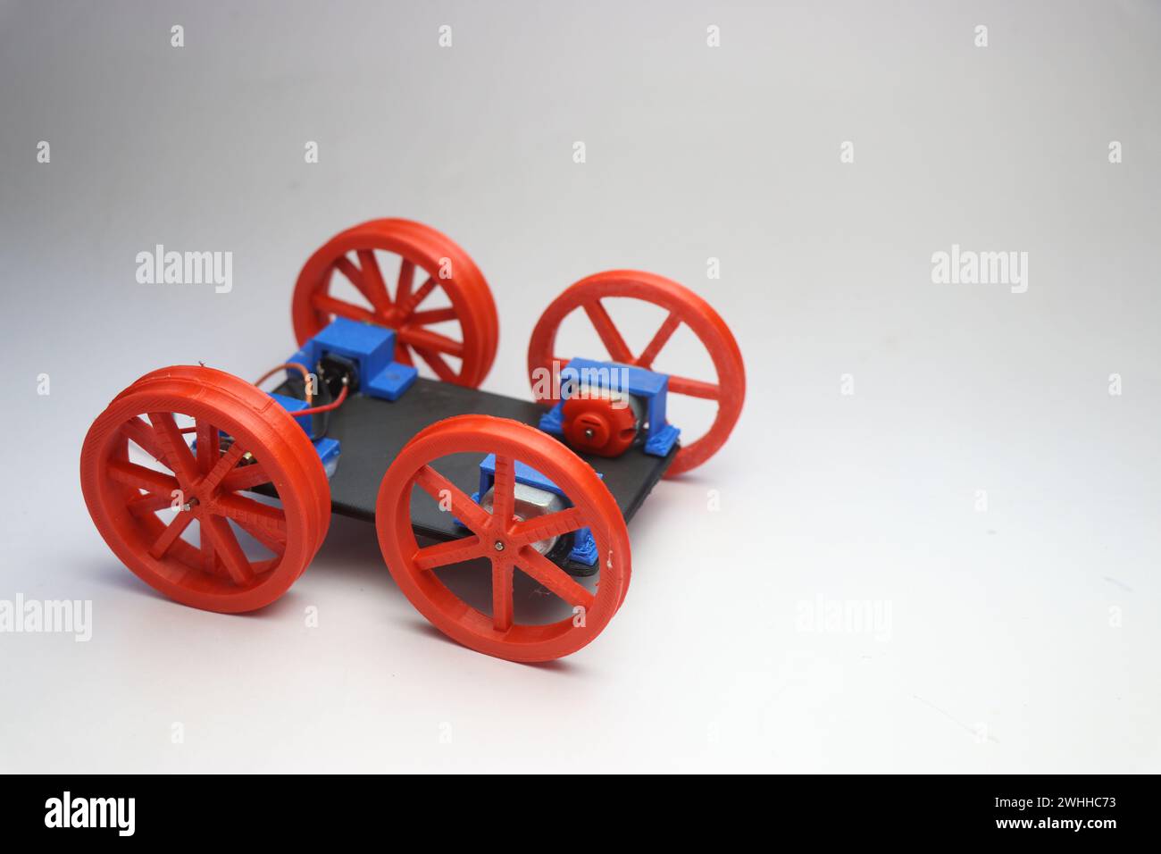 Model of an assembled wheel movement for a robotic car on a white ...