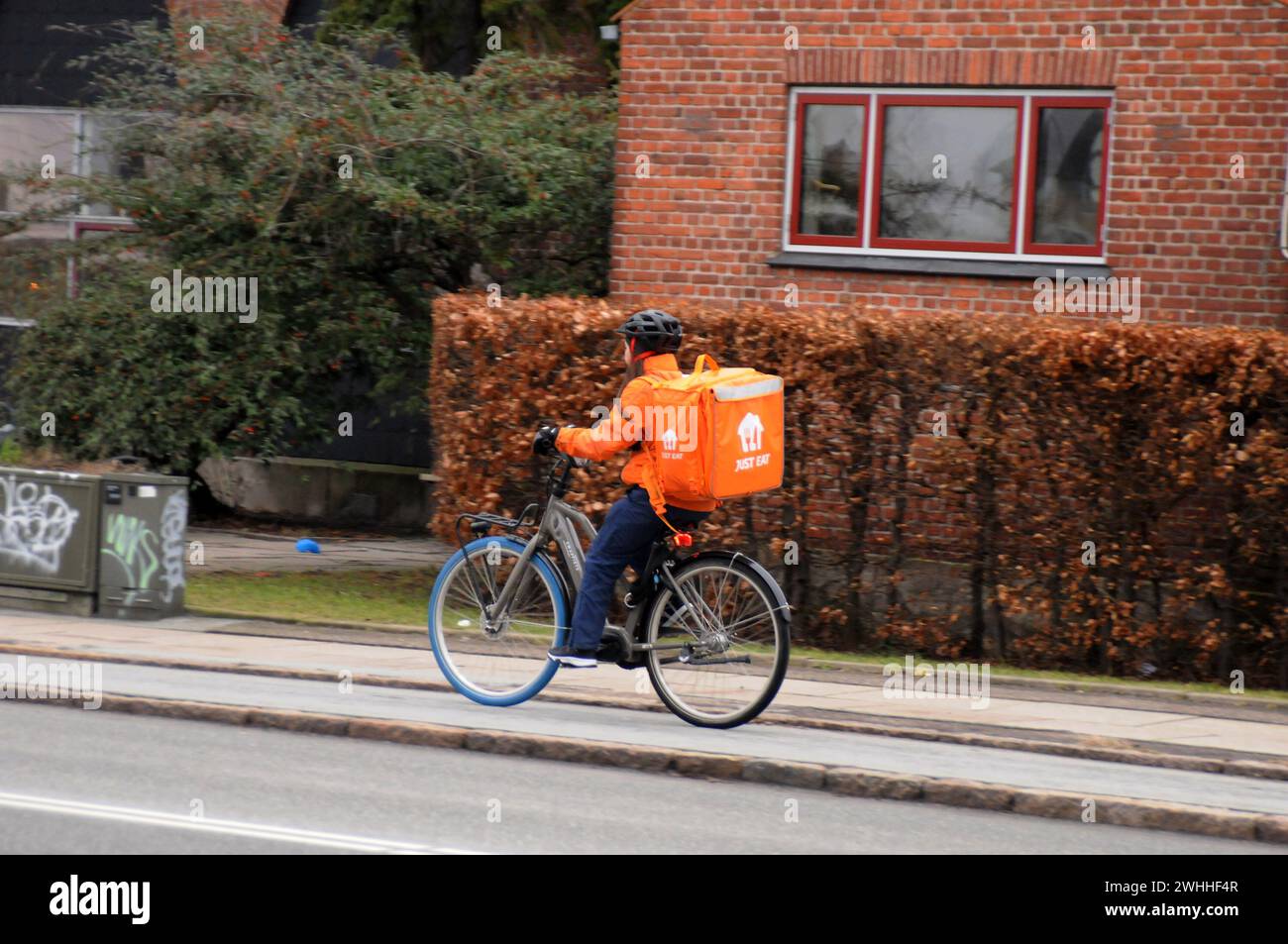 Copenhagen, Denmark /10 February 2024/.Just eat food delivery biker in ...