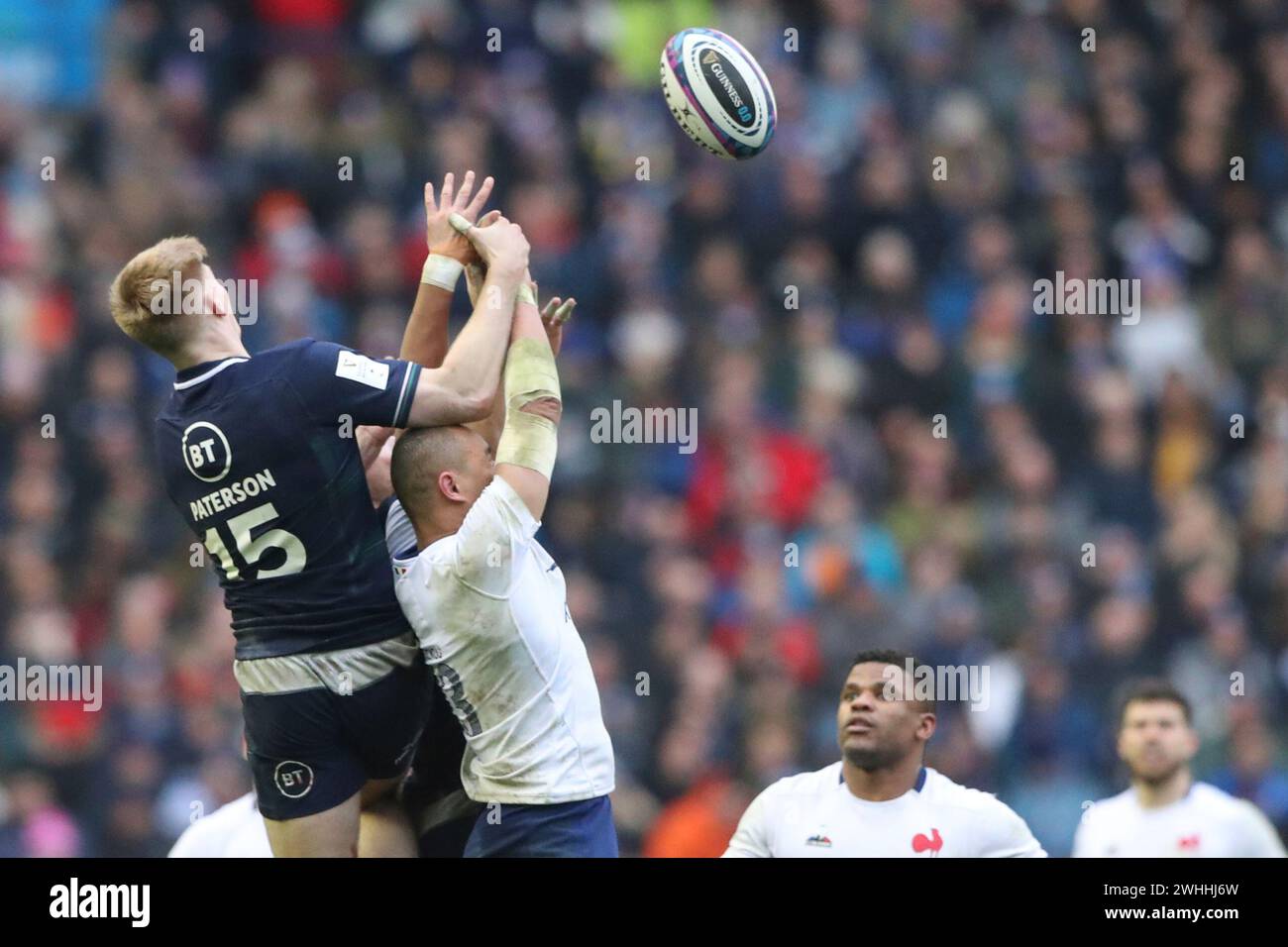 Scotland's Harry Paterson, left, vies of the ball with Gael Fickou of ...
