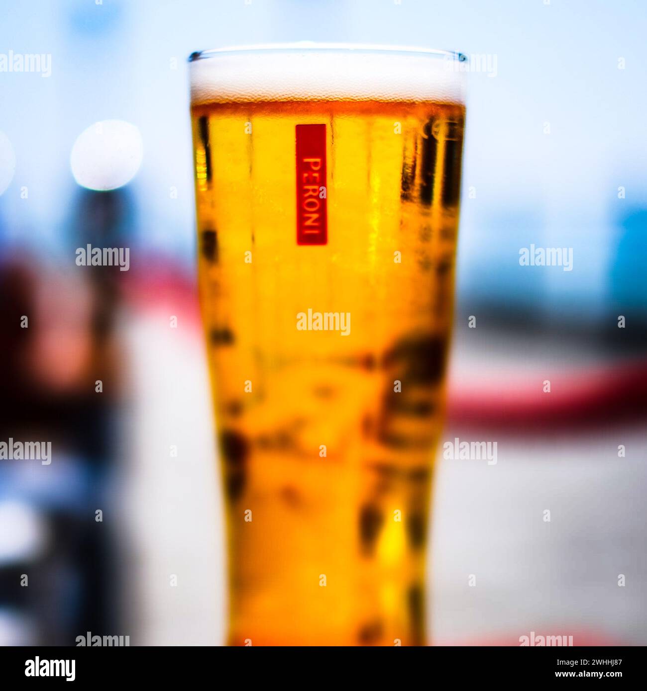 A full Peroni beer glass photographed outside Stock Photo - Alamy