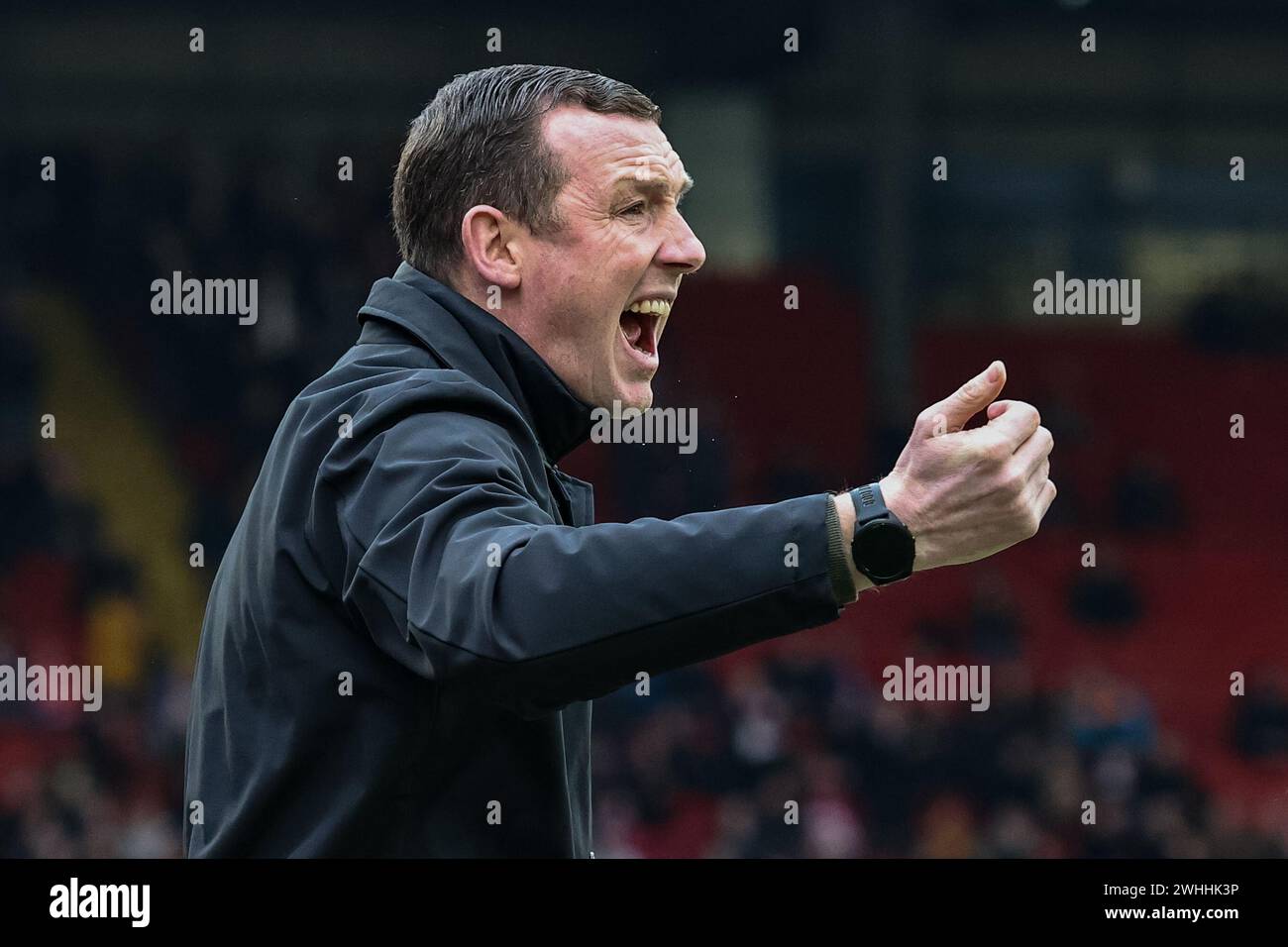 Neill Collins Head coach of Barnsley shouts instructions during the Sky ...