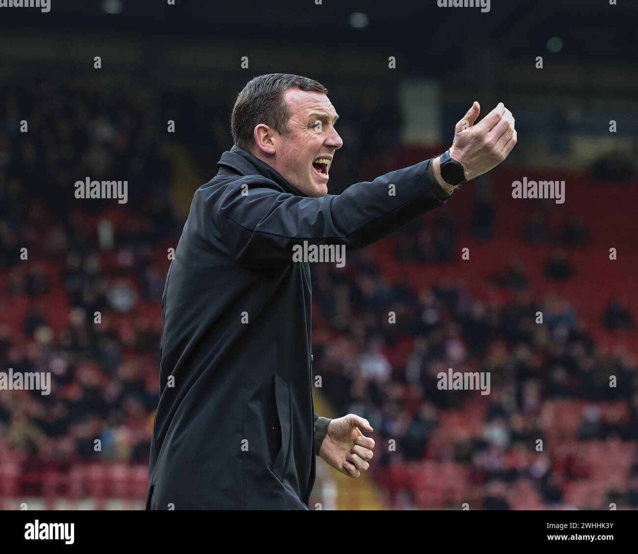 Neill Collins Head coach of Barnsley shouts instructions during the Sky ...