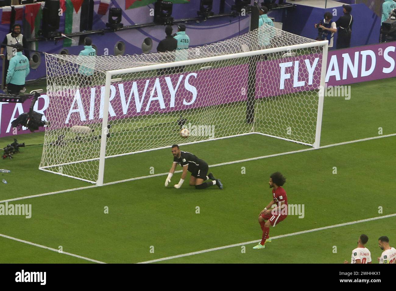 Qatar's Akram Afif scores a goal during the Asian Cup final soccer ...