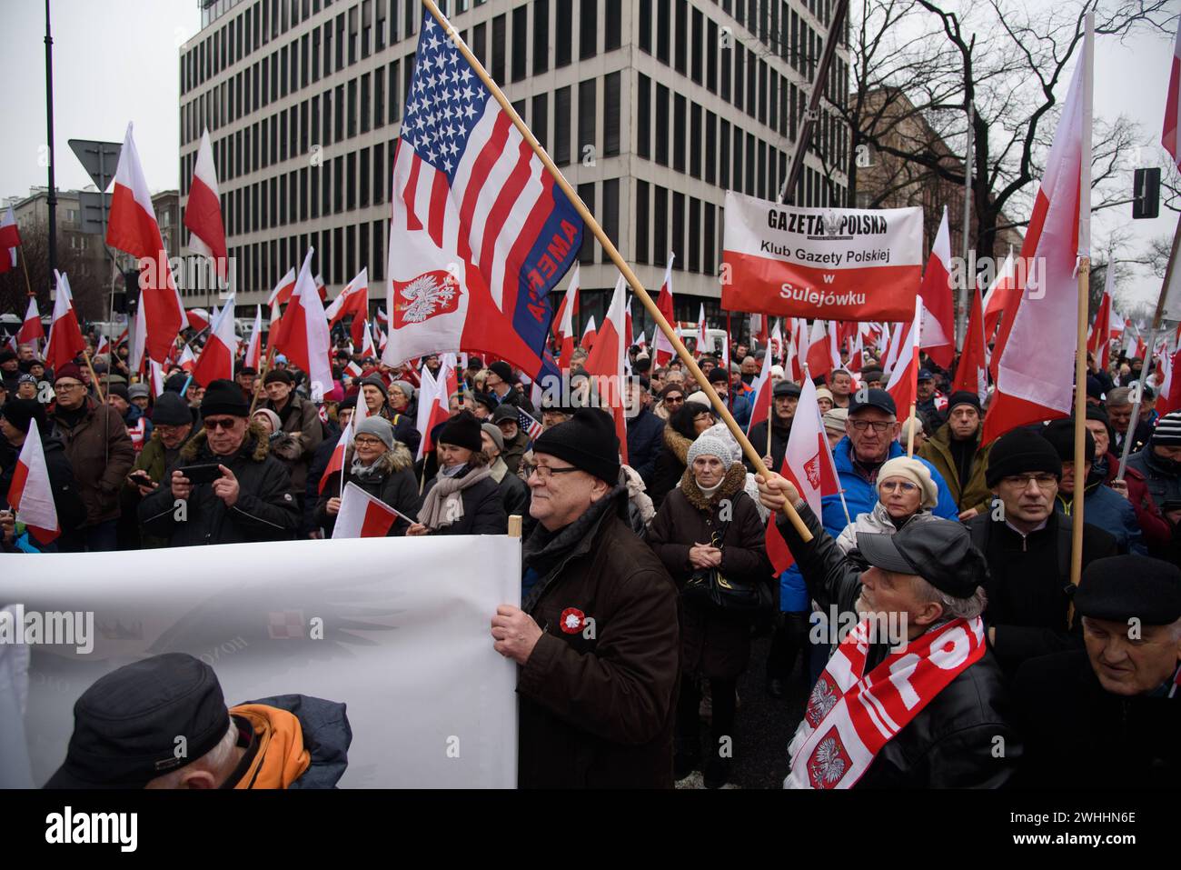 Anti-Government Protest In Warsaw. A demonstrator waves a flag of the ...