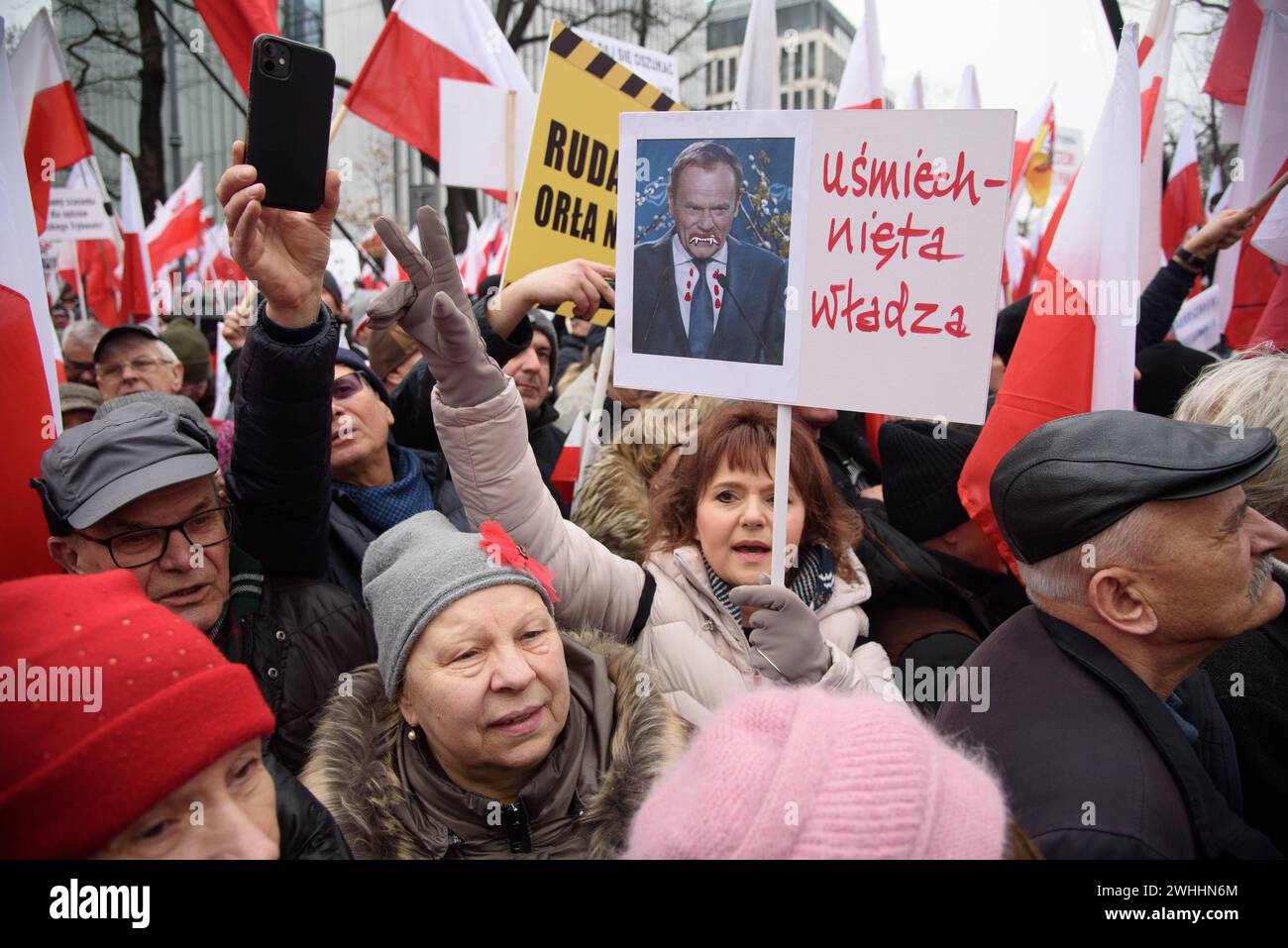 Anti-Government Protest In Warsaw. People shout slogans as they hold a ...