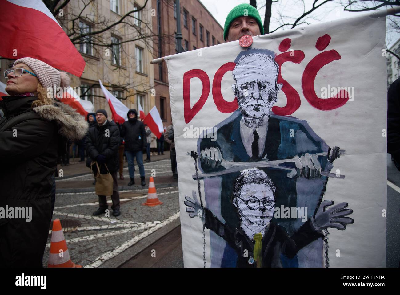 Anti-Government Protest In Warsaw. A demonstrator holds a banner ...