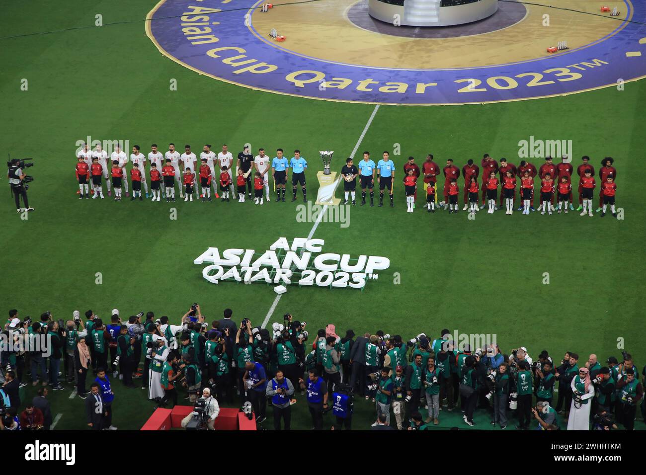 Qatar and Jordon squad line up for national anthem before the Asian Cup ...