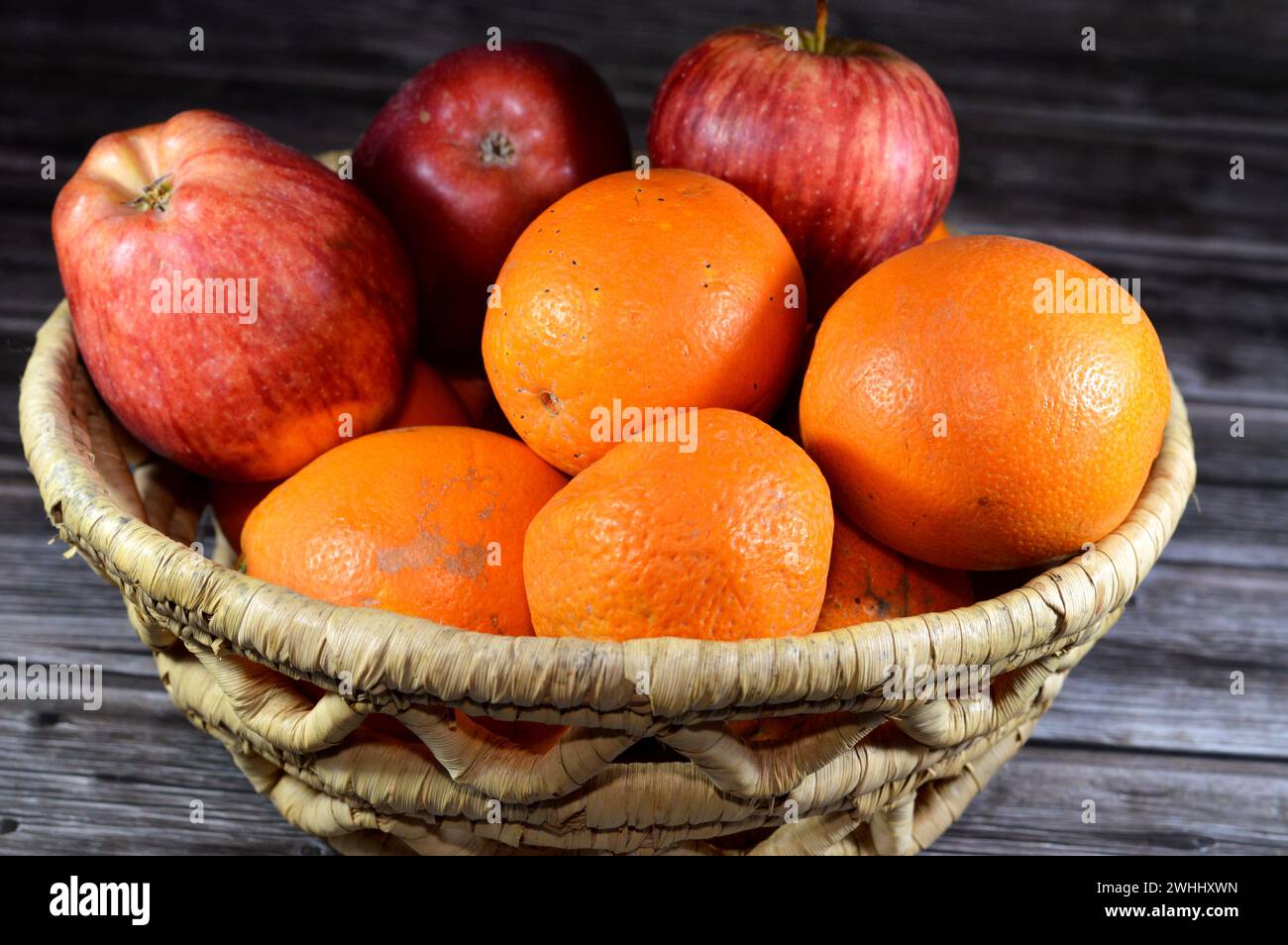 Assorted fresh fruits of orange, red apples and mandarin, fresh fruits ...