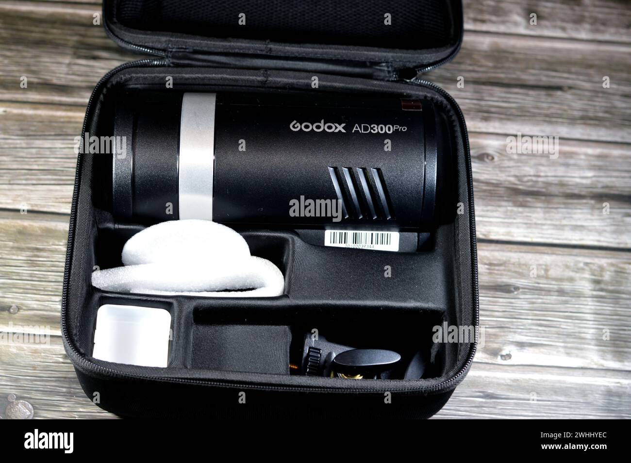 Cairo, Egypt, February 9 2024: A portable Godox AD300 Pro outdoor flash ...