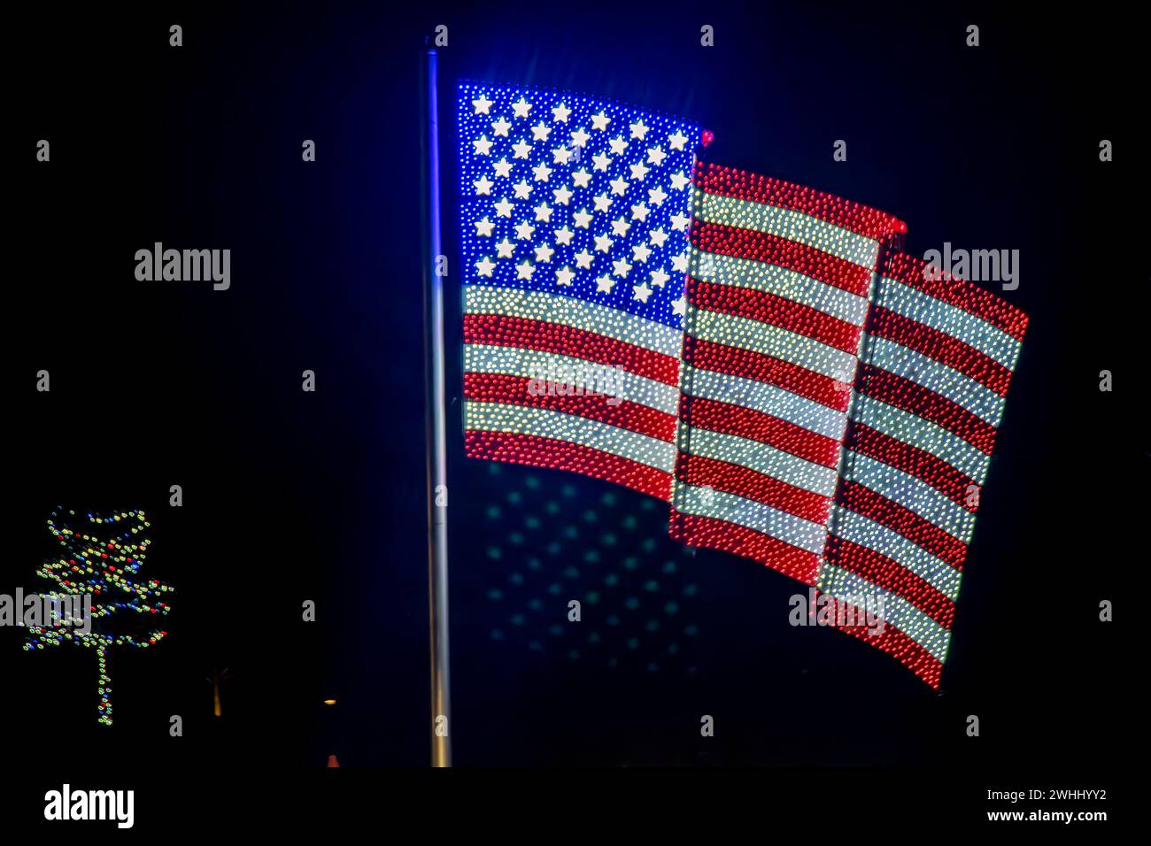 Nighttime Display Of Three American Flags Made Of Bright Lights Mounted ...