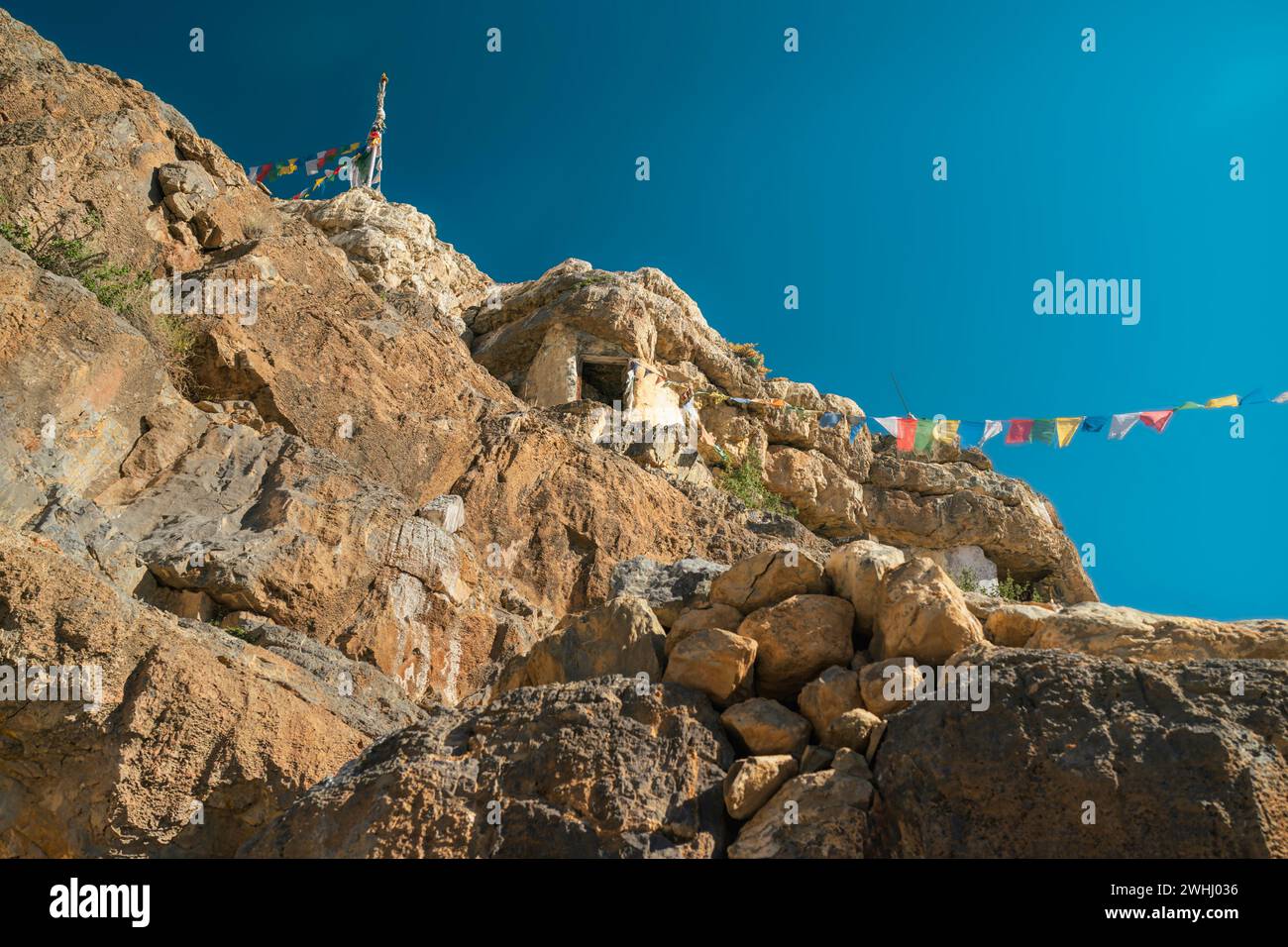 Buddhist monk retreat built on sharp Himalayan ridge and flanked by ...