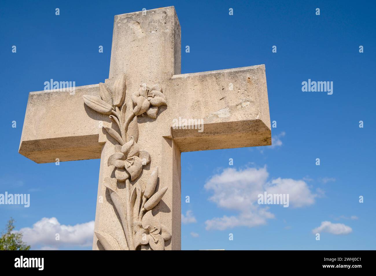 Cross with lilies Stock Photo - Alamy