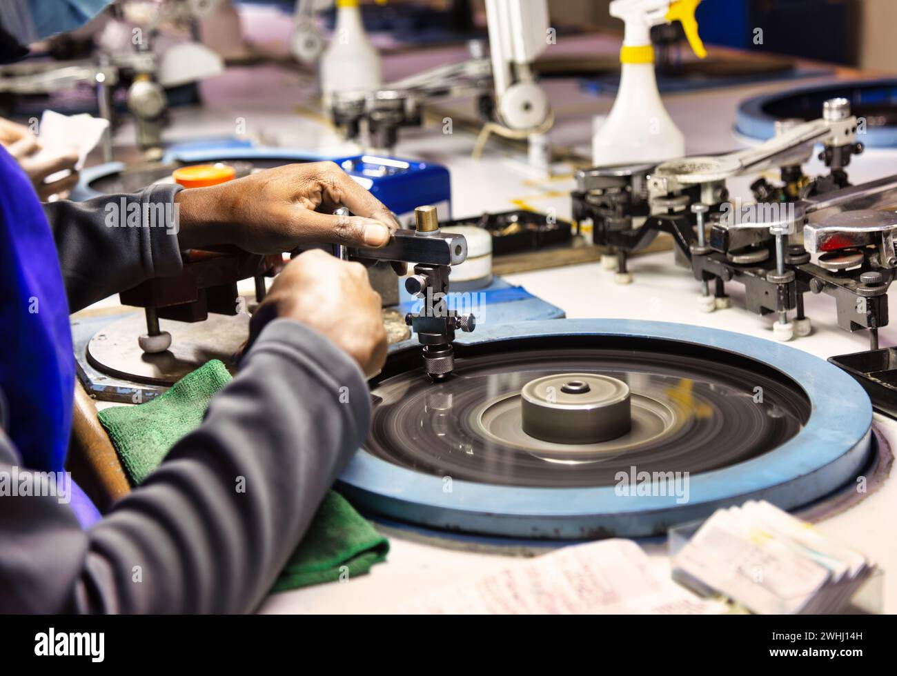 diamond polishers at work at the wheel in the diamond polishing factory ...