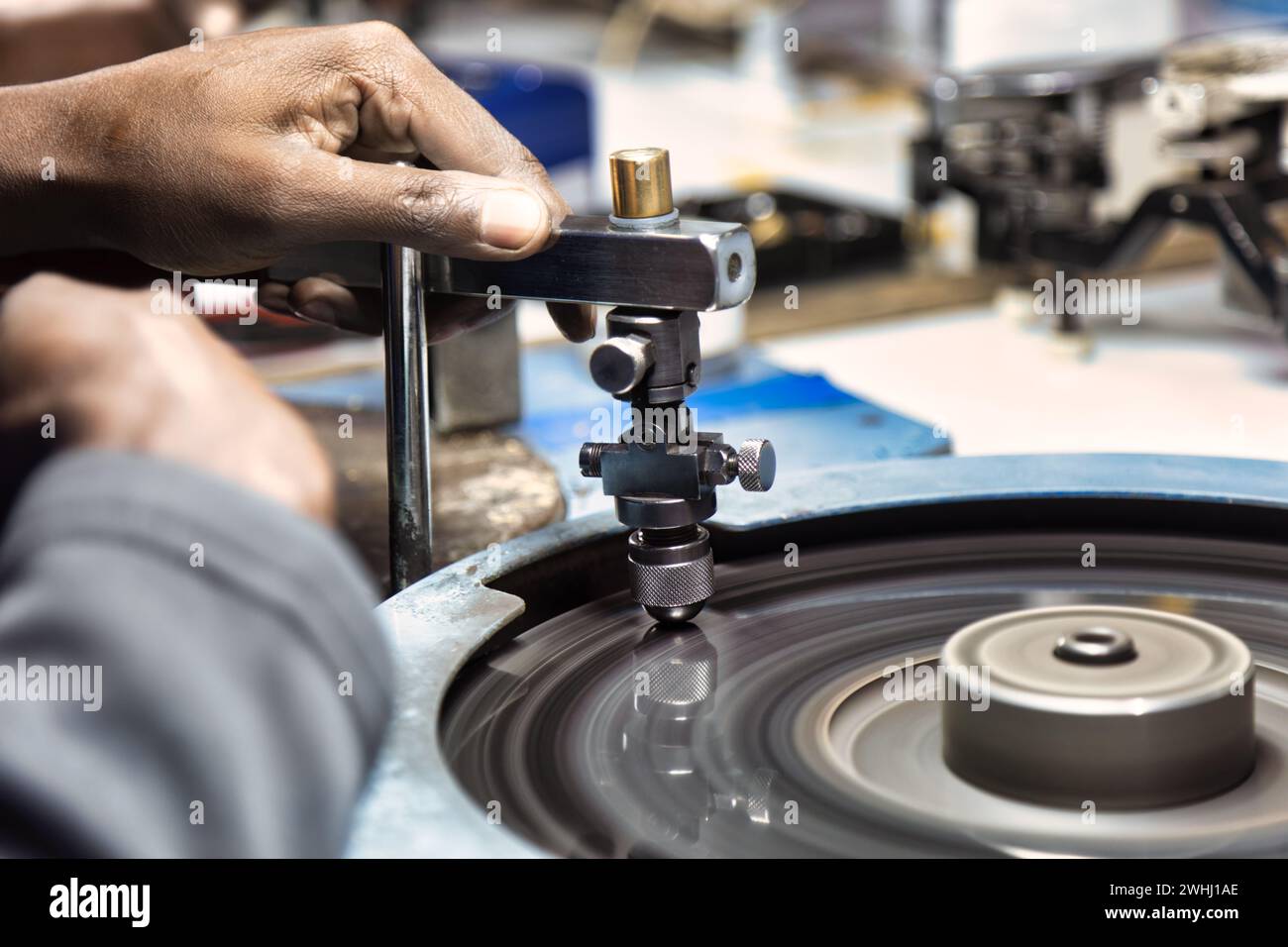 diamond polishers at work at the wheel in the diamond polishing factory ...
