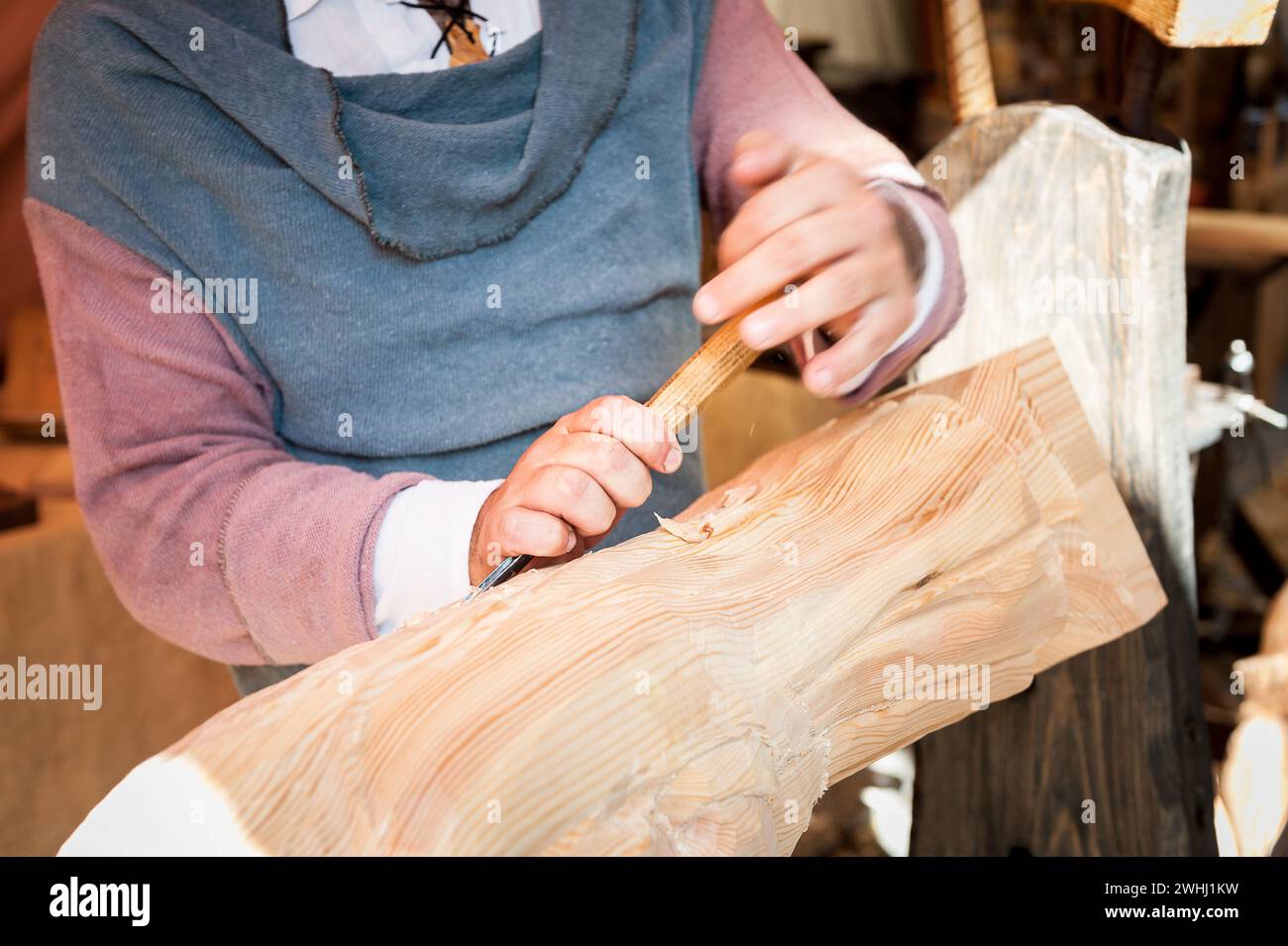 Craftsman working the wood with the gouge of the hand Stock Photo - Alamy