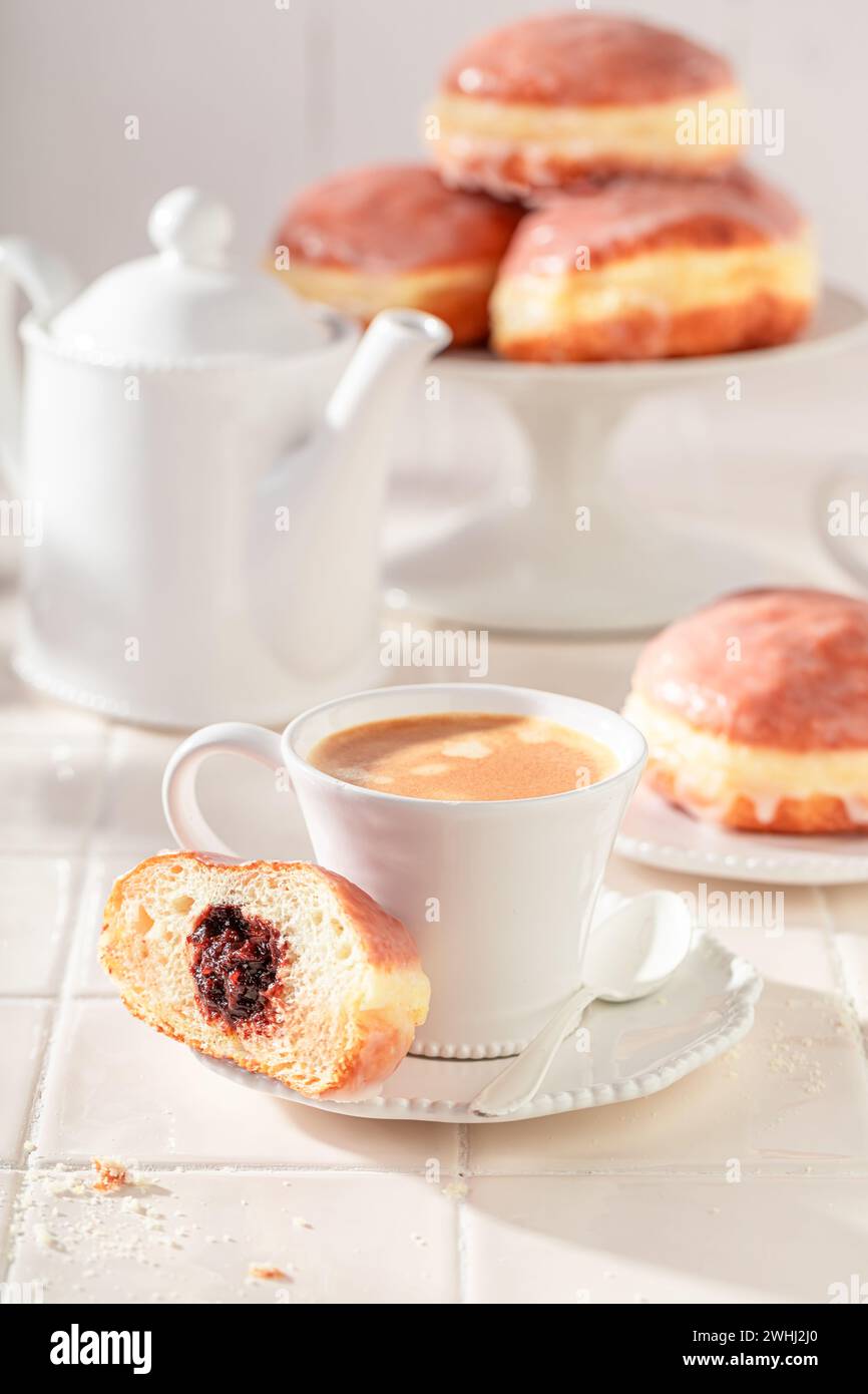 Sweet and hot doughnuts as a popular dessert in Poland. Donuts with jam ...