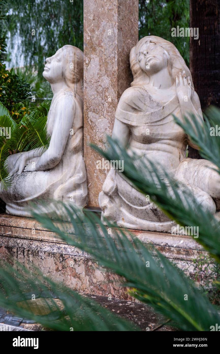 Two imploring women Stock Photo - Alamy