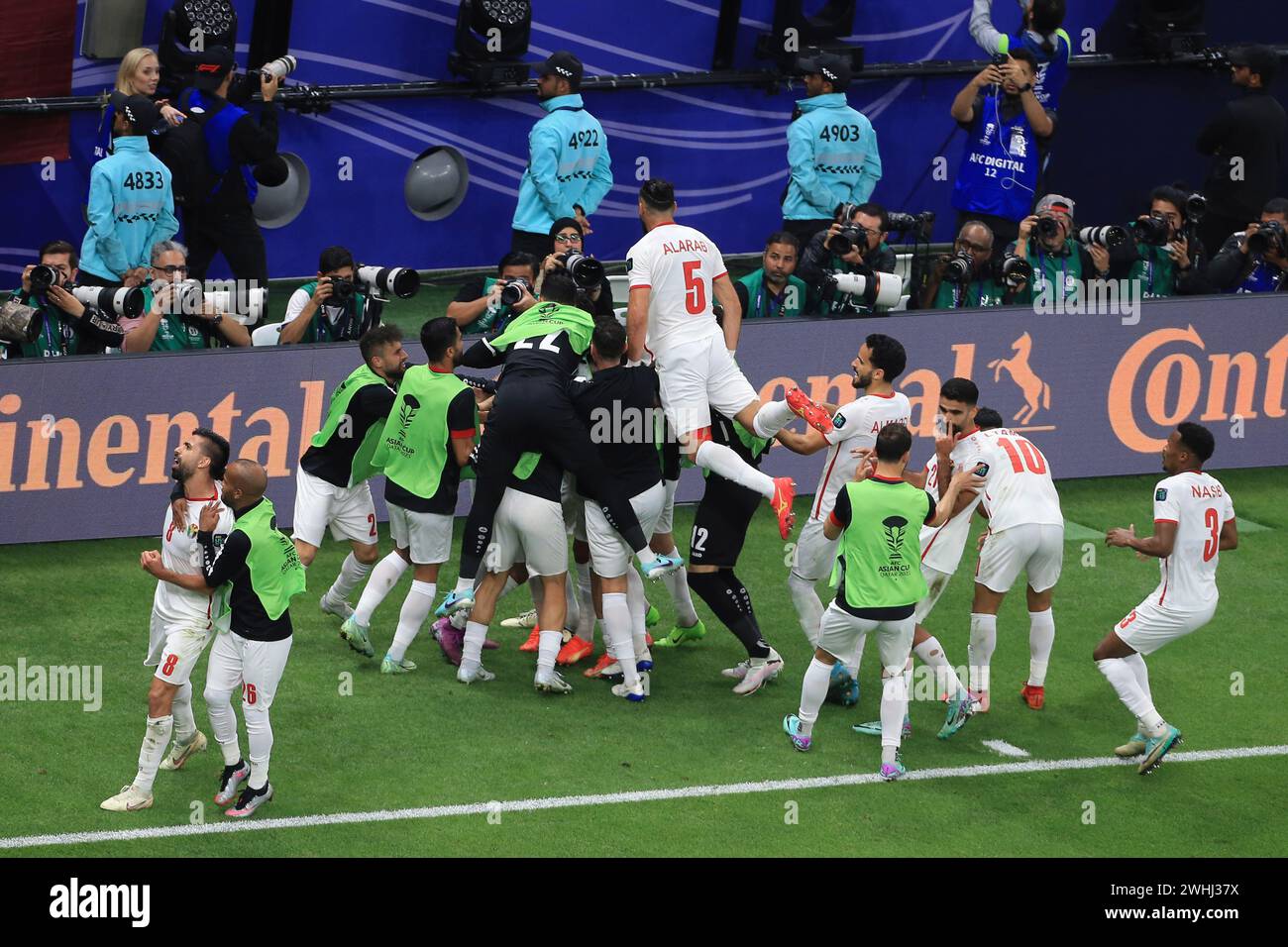 Jordan players celebrate after Yazan Alnaimat scored his side's opening ...