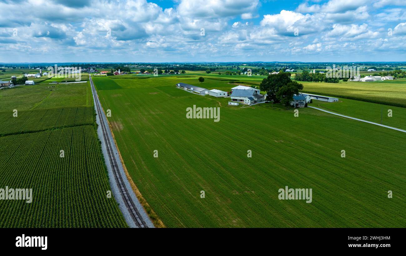 Expansive Aerial Perspective Of Multiple Farm Buildings Nestled Among ...
