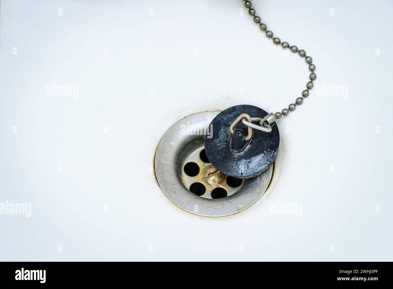 Old basin plug on chain hi-res stock photography and images - Alamy