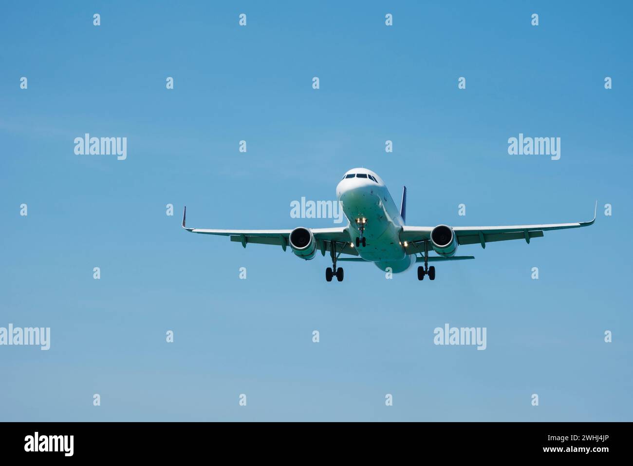 Aircraft extended the landing gear before landing Stock Photo - Alamy