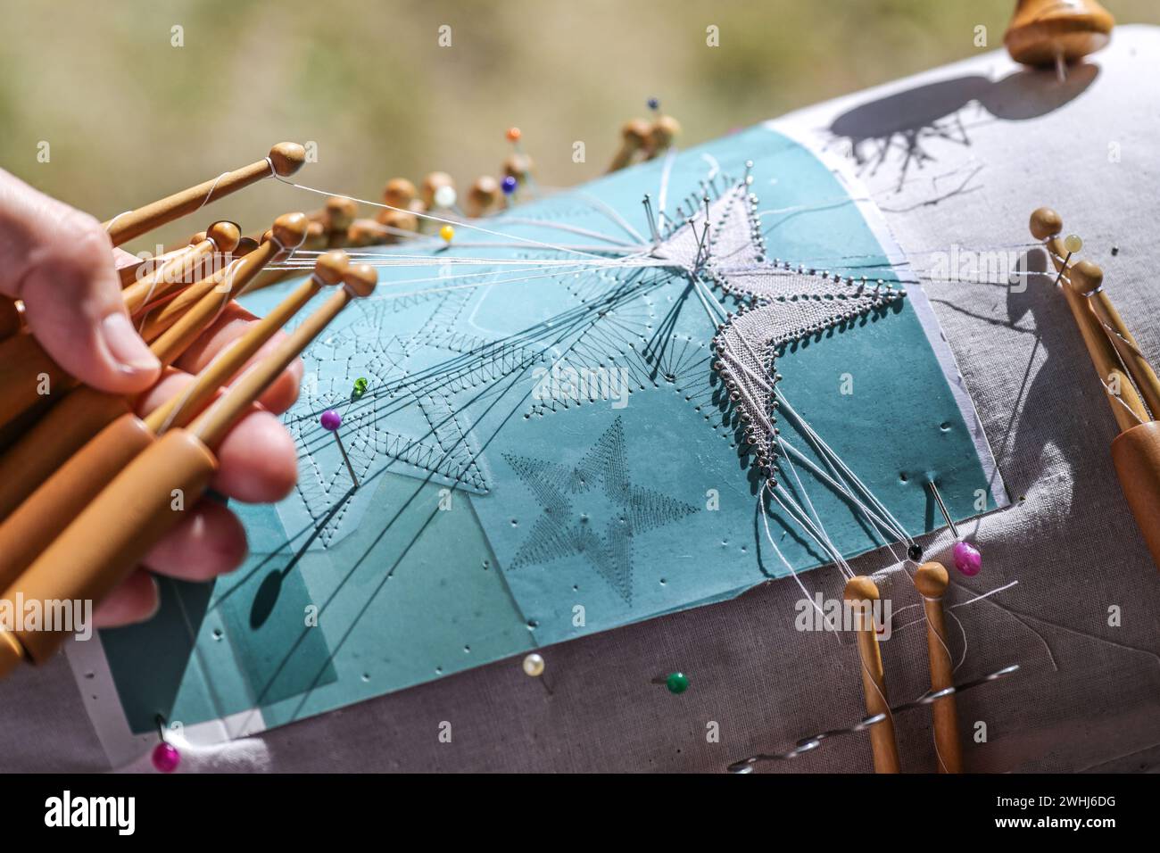 Female hands weaving lace bobbins hi-res stock photography and images ...