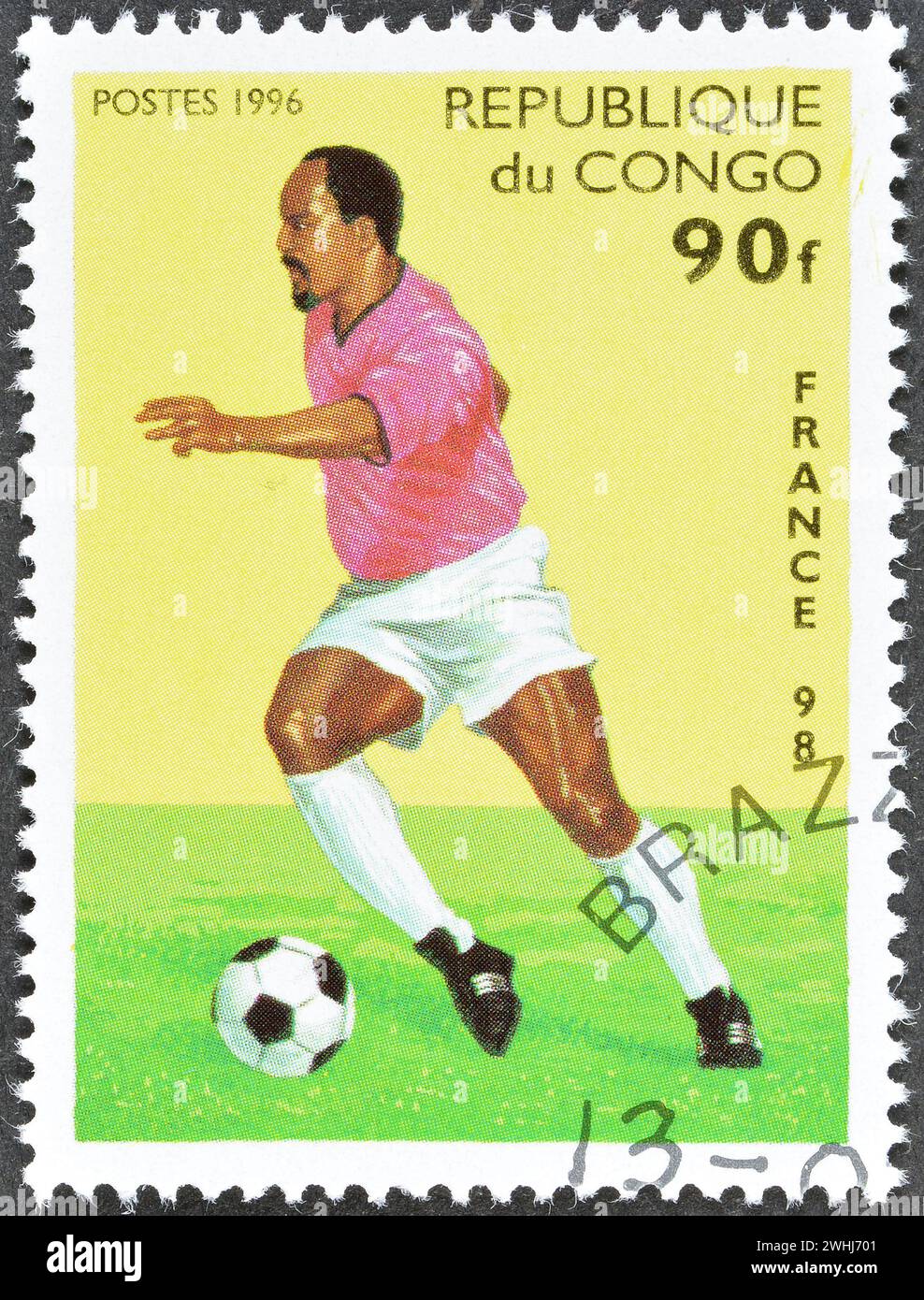 Cancelled postage stamp printed by Congo, that shows Football player ...