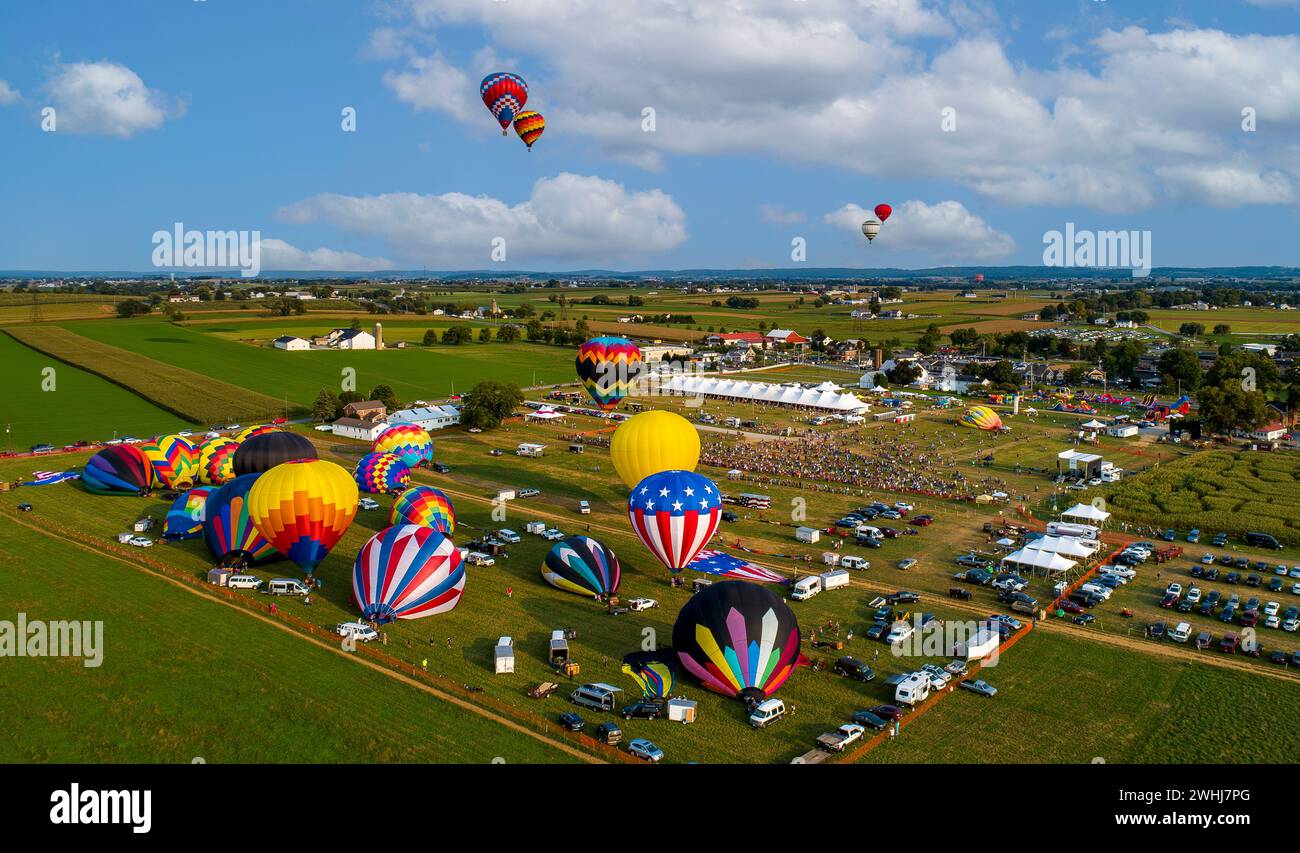 Aerial View Of Many Hot Air Balloons Launching and Floating Away During ...