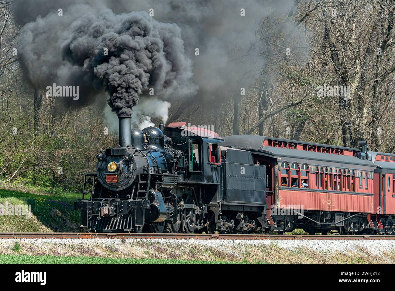 Angled View of a Restored Steam Passenger Train Moving Slowly Blowing ...