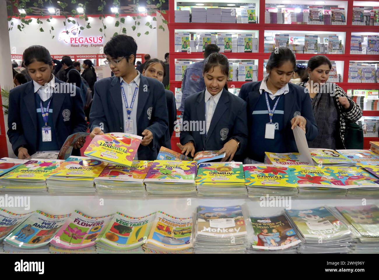 New Delhi, India. 10th Feb, 2024. Students visit the book stalls on the ...