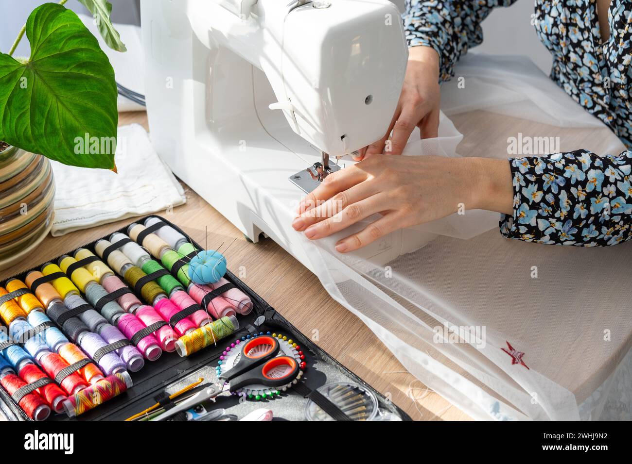 Woman Hand Close Up Sews Tulle On Electric Sewing Machine Filling The