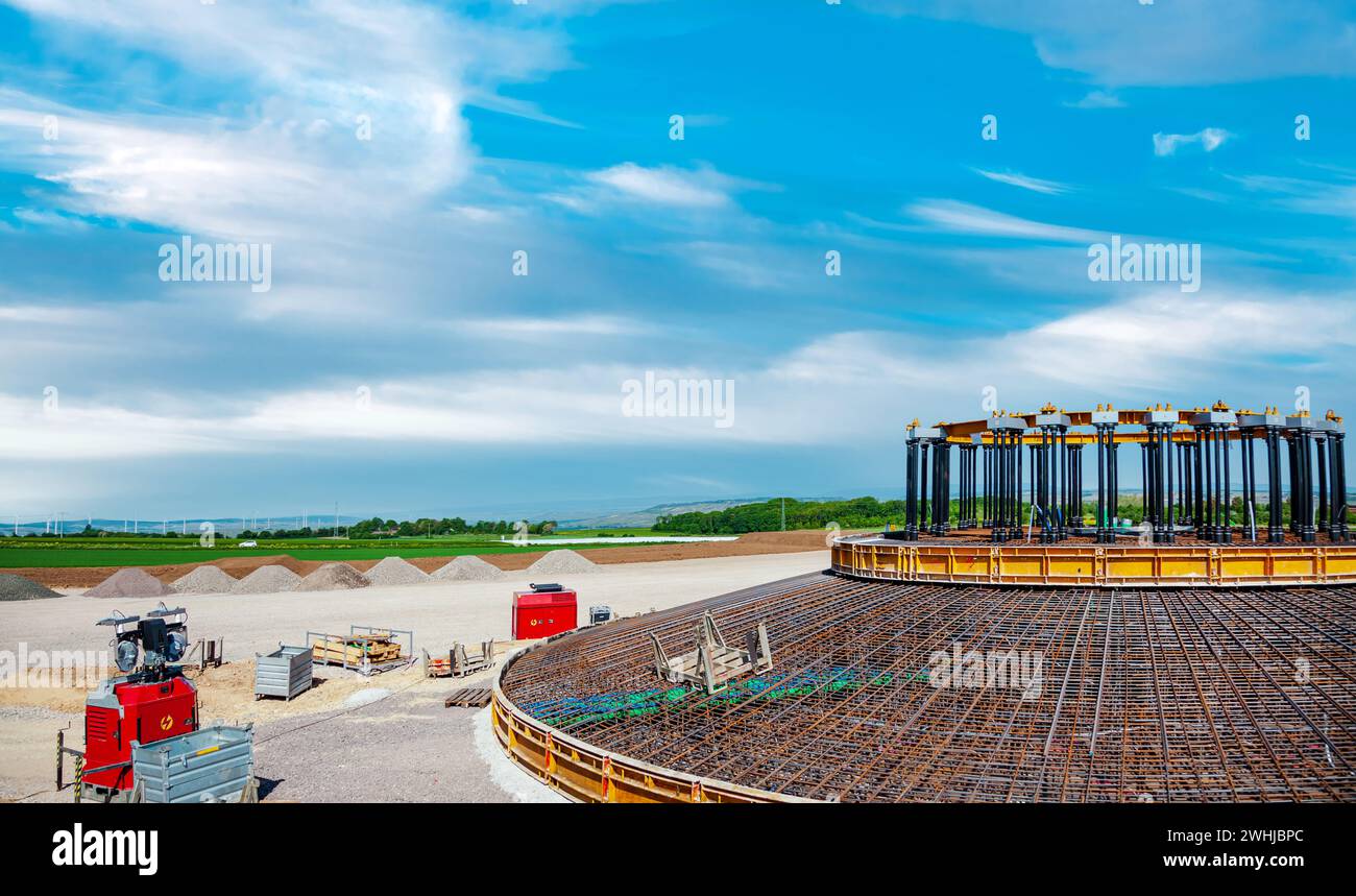 Construction site. concrete foundation of wind turbines with concrete ...