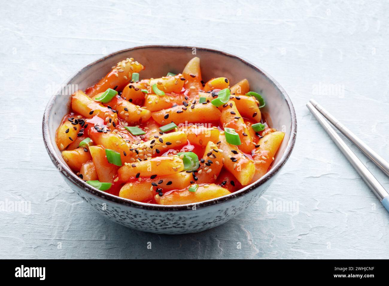 Tteokbokki or topokki, Korean street food, spicy rice cakes Stock Photo ...