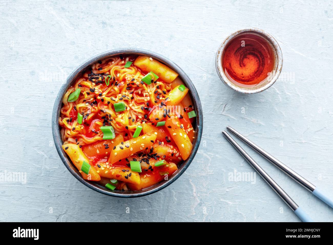 Rabokki, tteokbokki or topokki with ramen, Korean street food, spicy ...