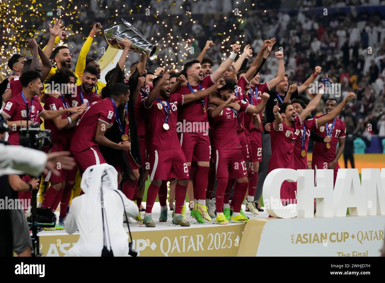 Qatar players celebrate with the trophy after winning the Asian Cup ...