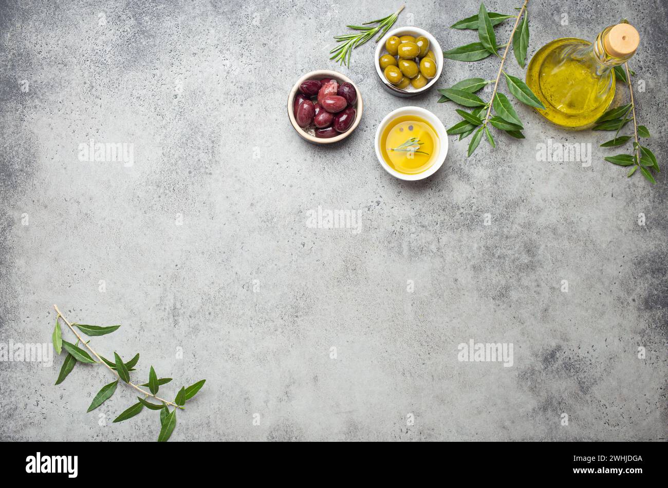 Composition with green and brown olives, extra virgin olive oil in ...