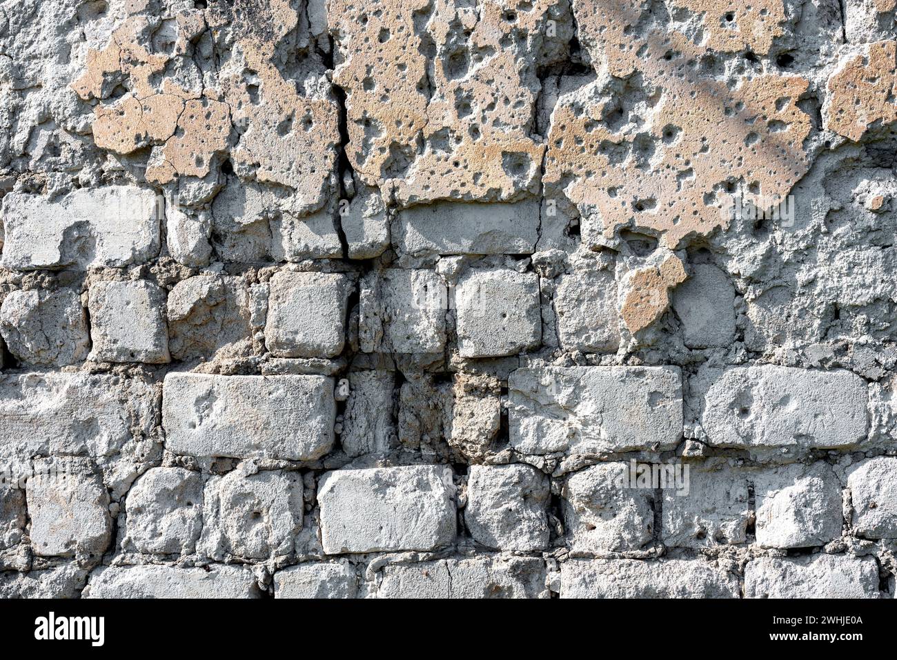 Pattern explosion-damaged wall of the house in Ukraine Stock Photo - Alamy