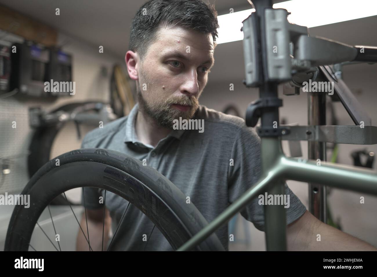 Repairing bicycle tire rim with automotive tire engineer using machine ...