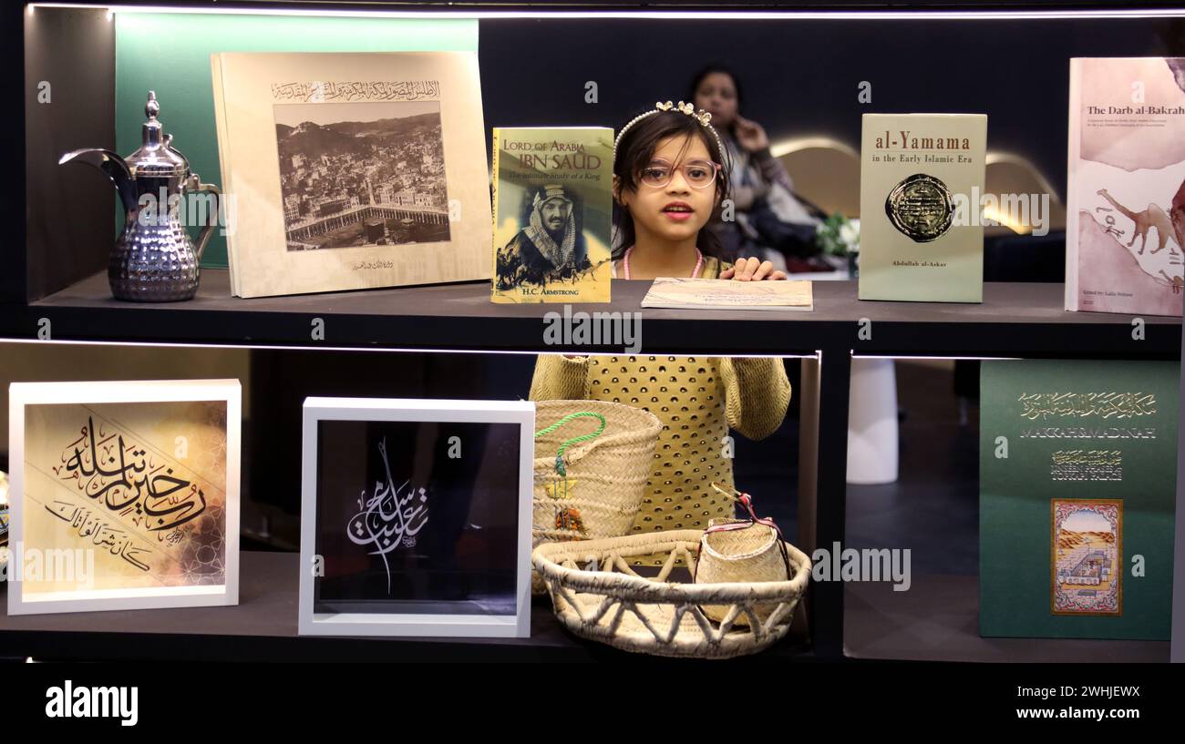 New Delhi, India. 10th Feb, 2024. A child visits the book stalls on the ...