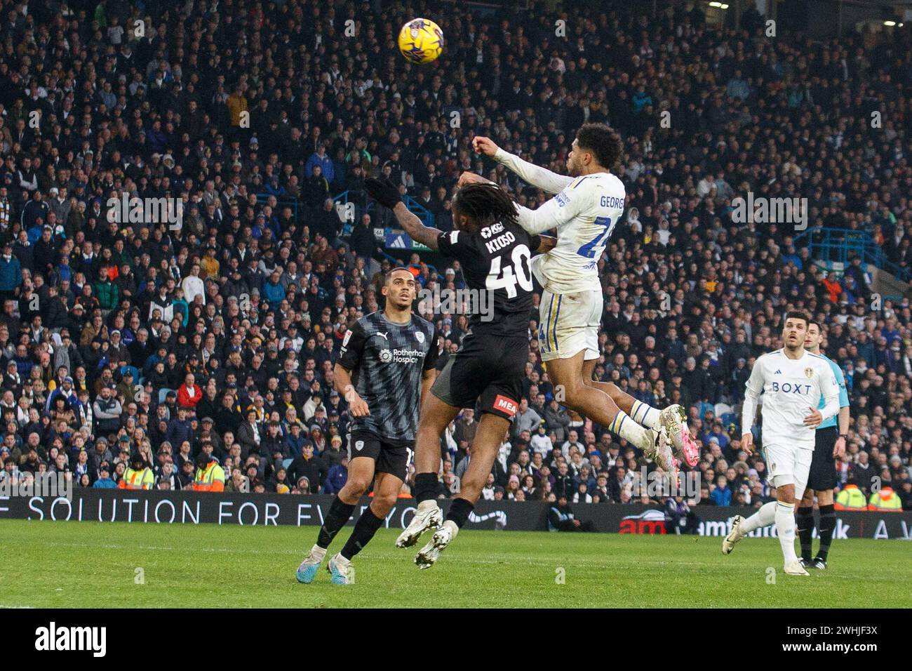 Peter Kioso #40 of Rotherham United F.C in aerial challenge with ...