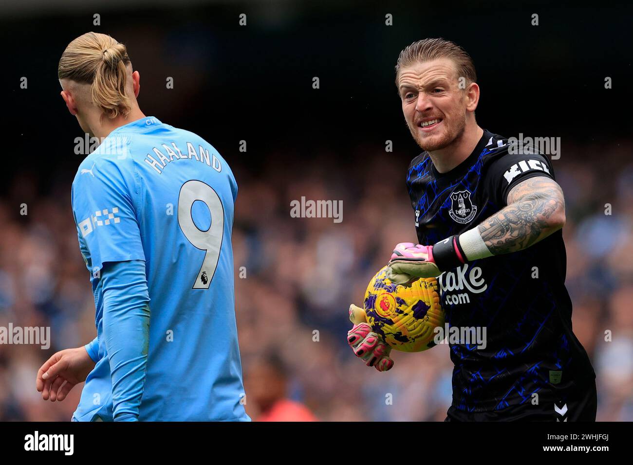 Jordan Pickford of Everton gestures to Erling Haaland of Manchester ...